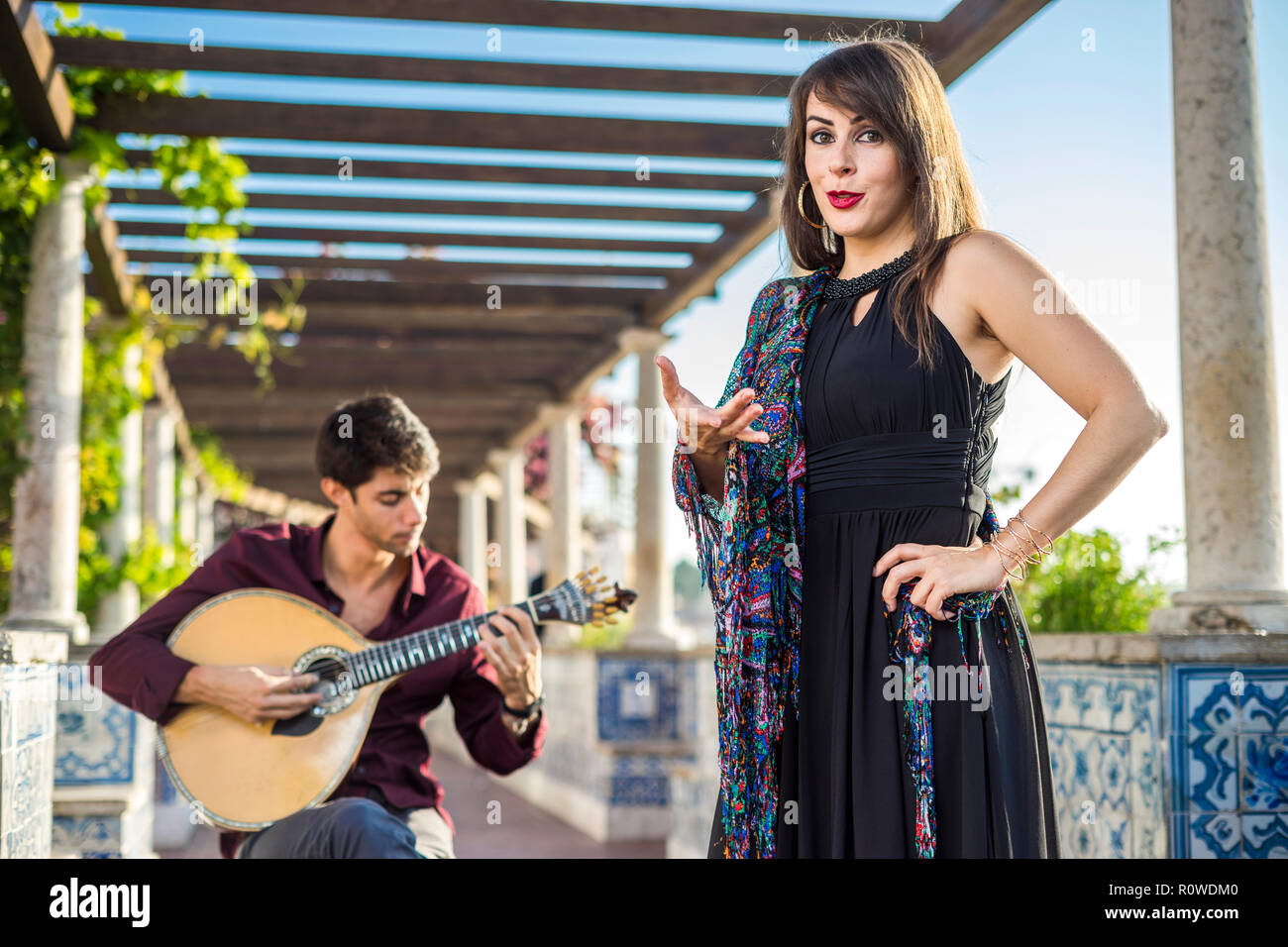 Band performing traditional music fado under pergola with portuguese ...