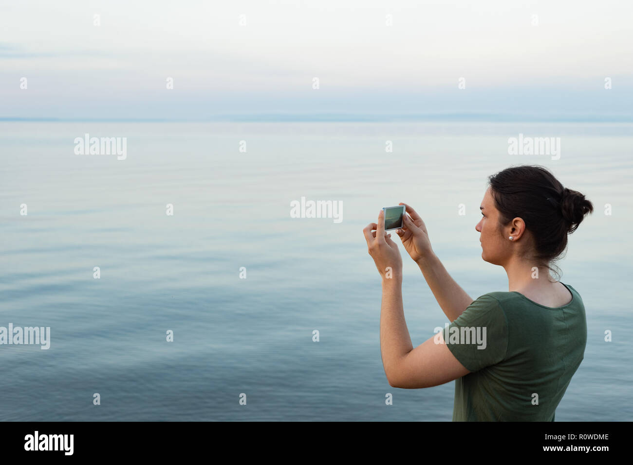Woman clicking photos nature hi-res stock photography and images - Alamy