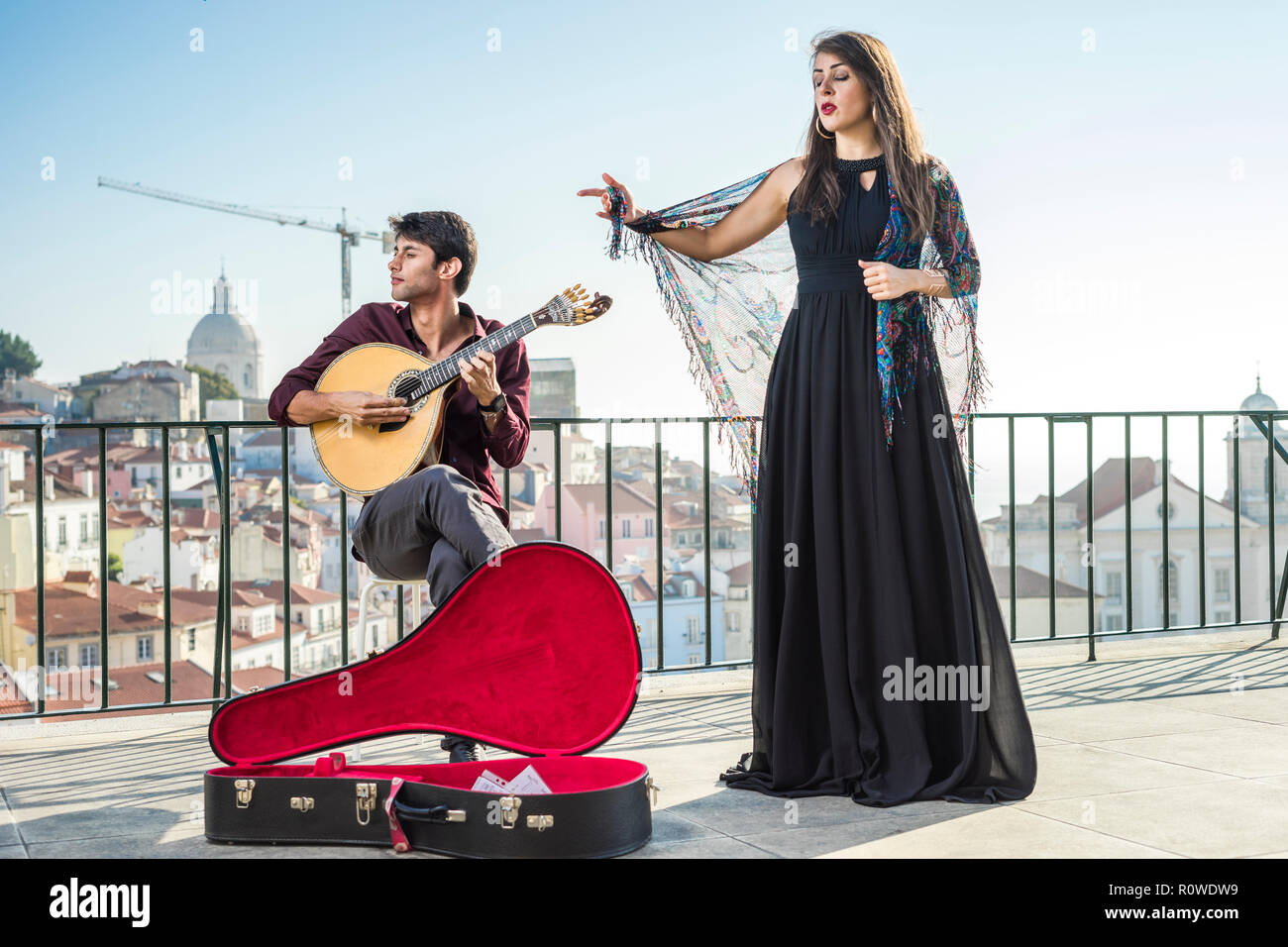 Beautiful fado singer performing with handsome portuguese guitarist ...