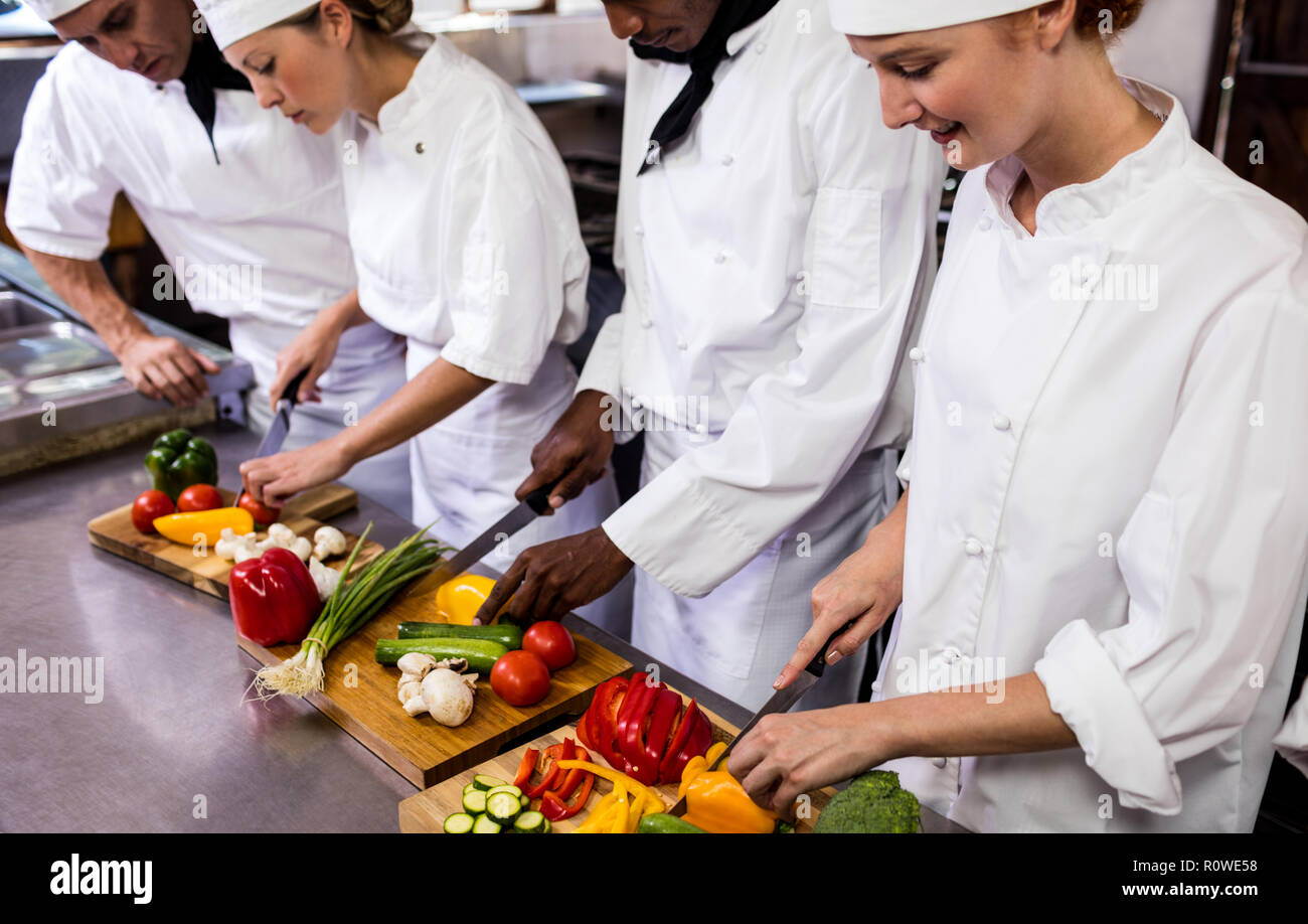 Black chef holding vegetable hi-res stock photography and images - Alamy