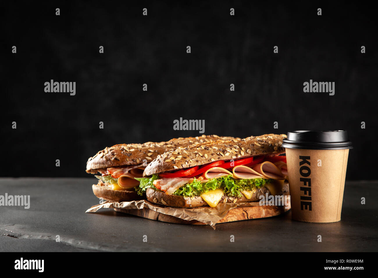 Classic BLT sandwiches on dark background Stock Photo - Alamy