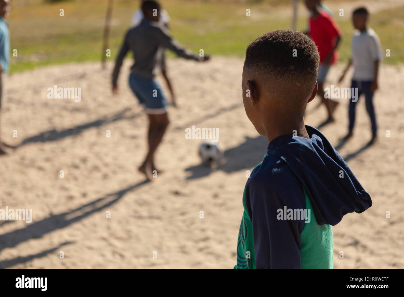 Boy looking at ground hi-res stock photography and images - Alamy
