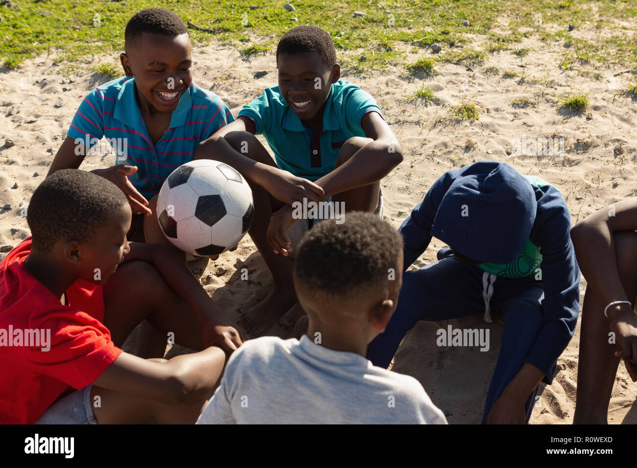 Kids sitting sports ground hi-res stock photography and images - Alamy