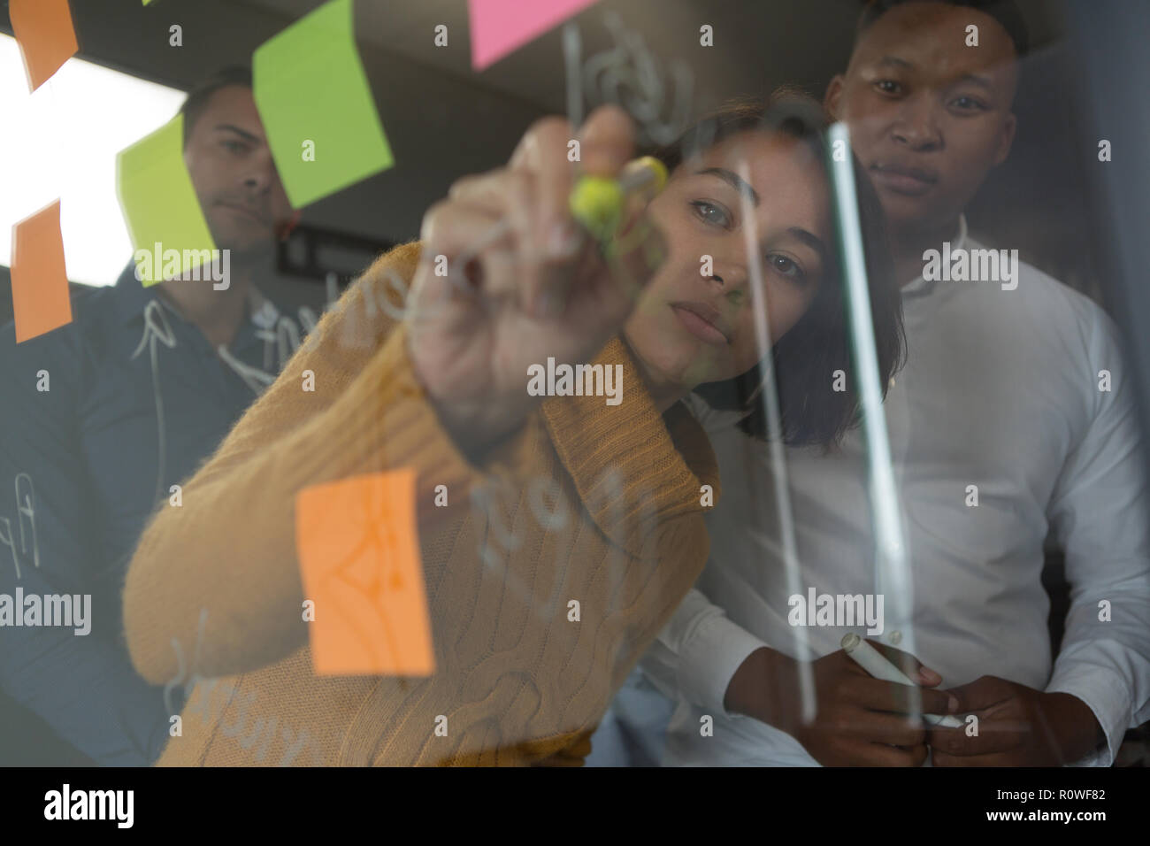 Woman glass wall writing hi-res stock photography and images - Alamy