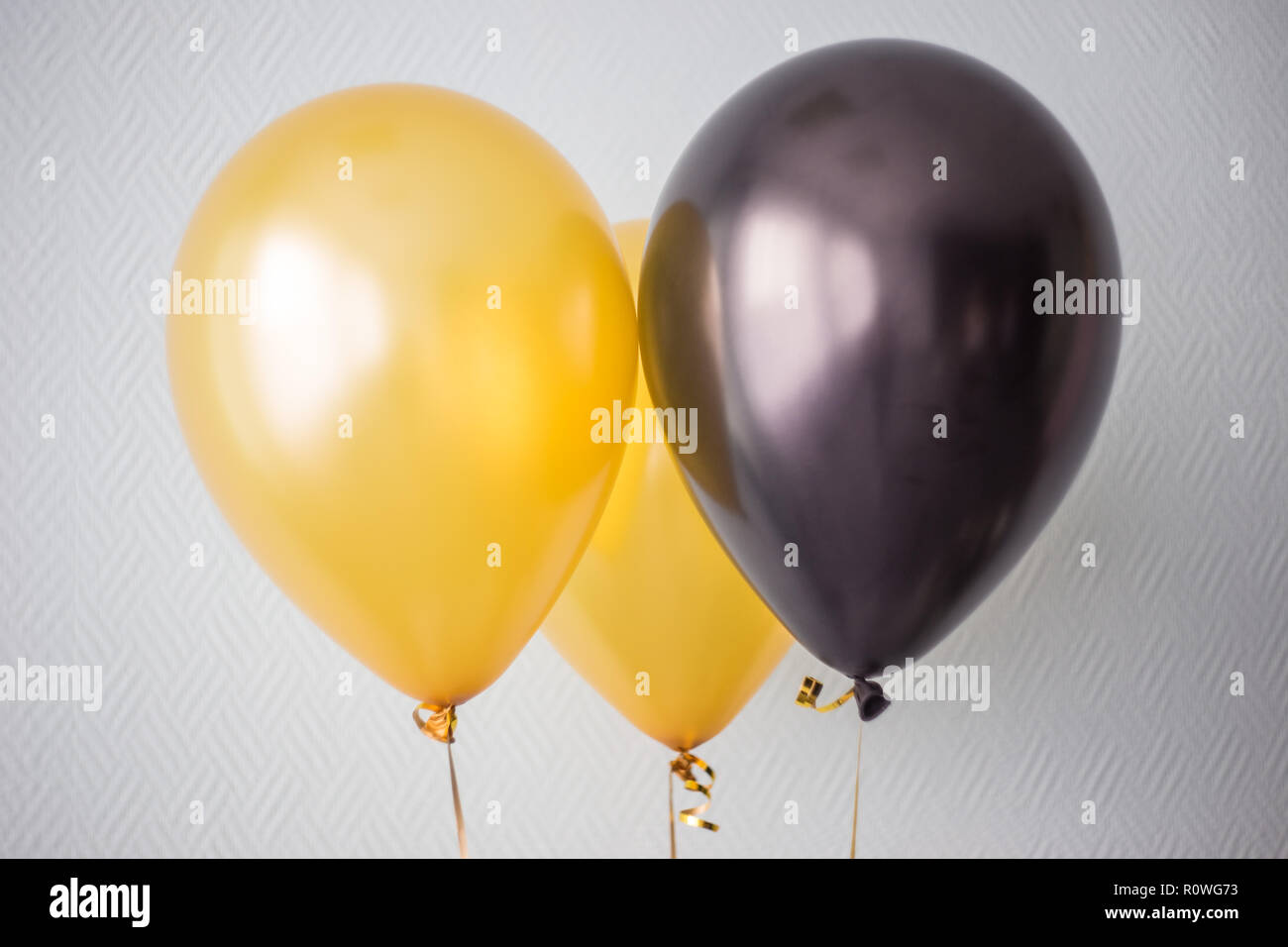 yellow and black floating helium balloons Stock Photo - Alamy yellow and black floating helium balloons Stock Photo - Alamy