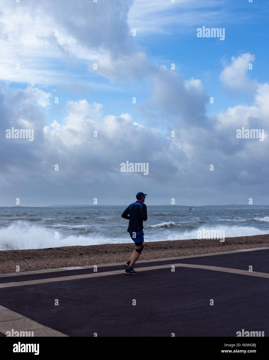 Man running jogging training beach hi-res stock photography and images ...