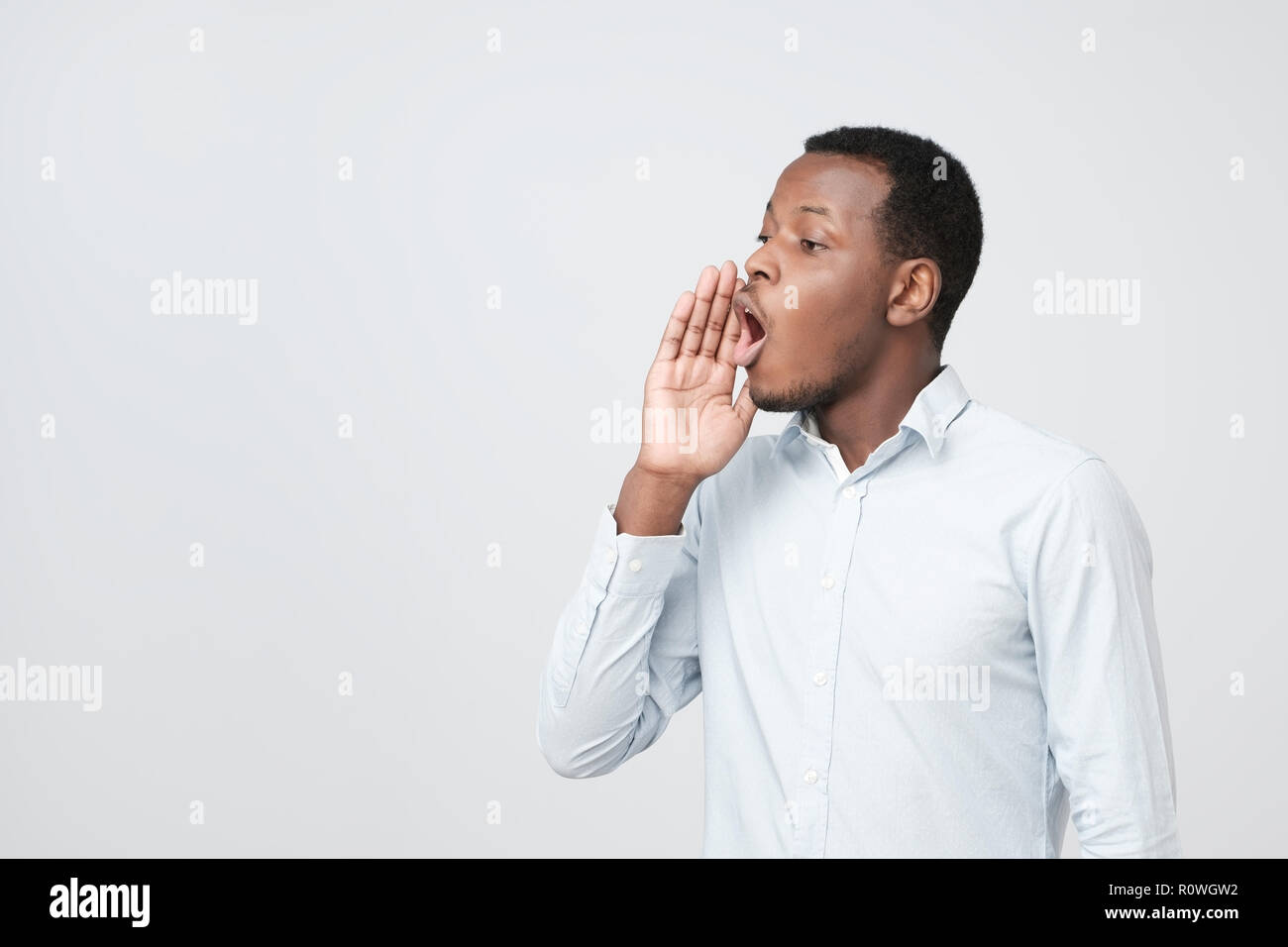Hand over mouth african hi-res stock photography and images - Alamy