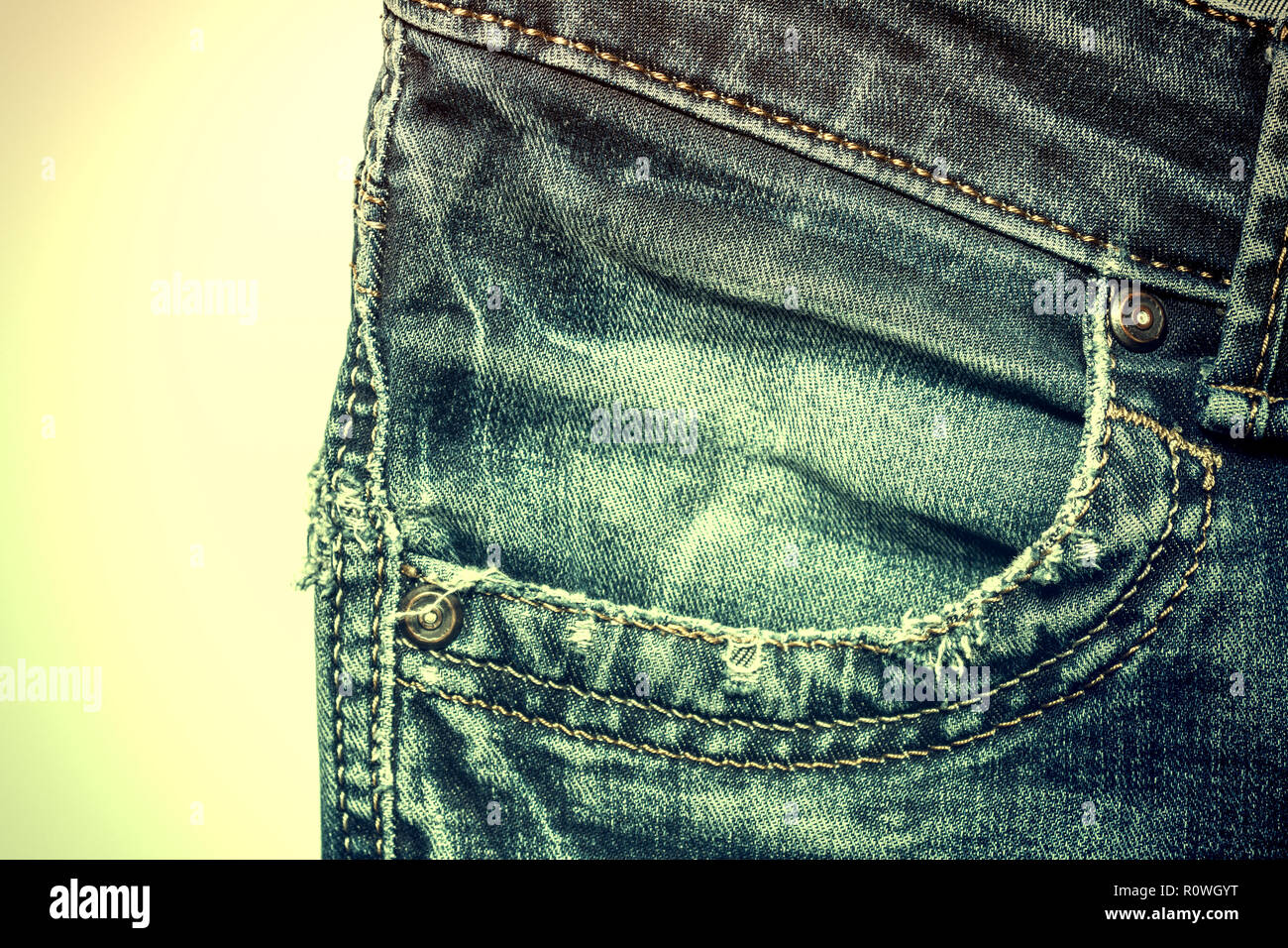 Front pocket stitching blue jeans close-up isolated on white background ...