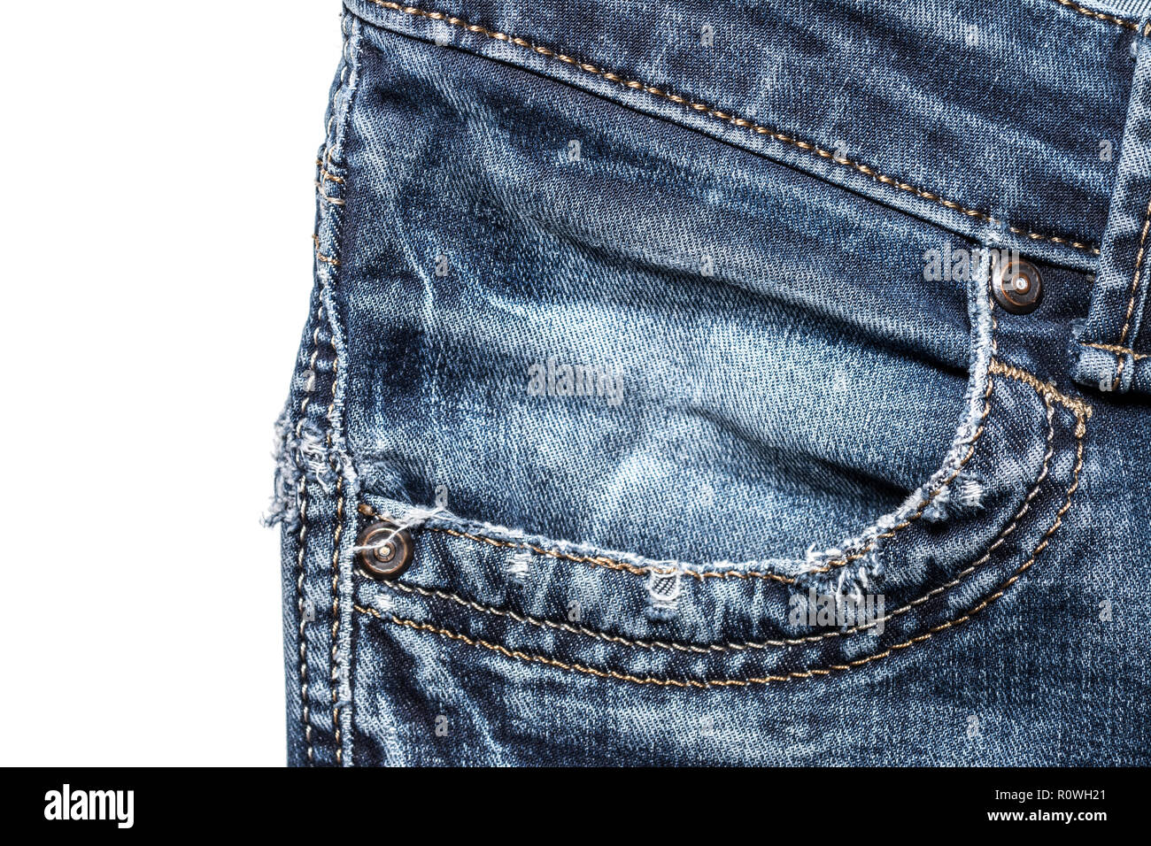 Front pocket stitching blue jeans close-up isolated on white background ...