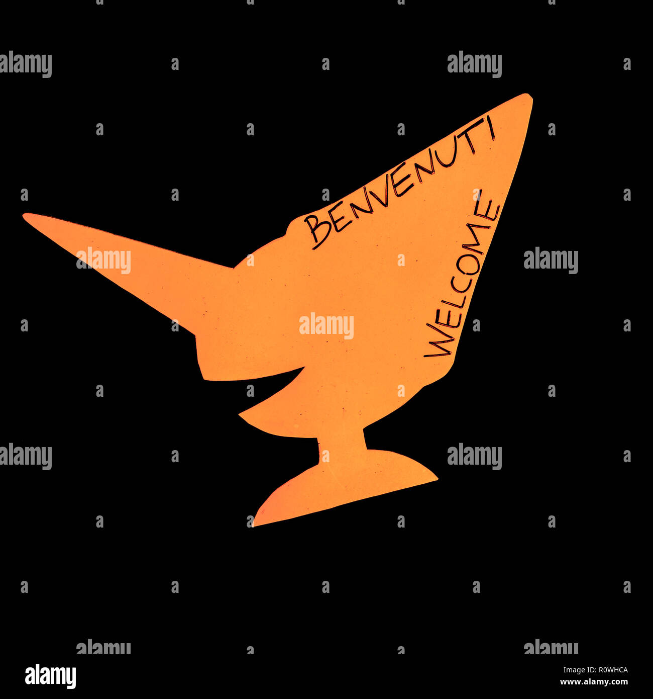 Black and Orange pinocchio welcome sign Stock Photo - Alamy