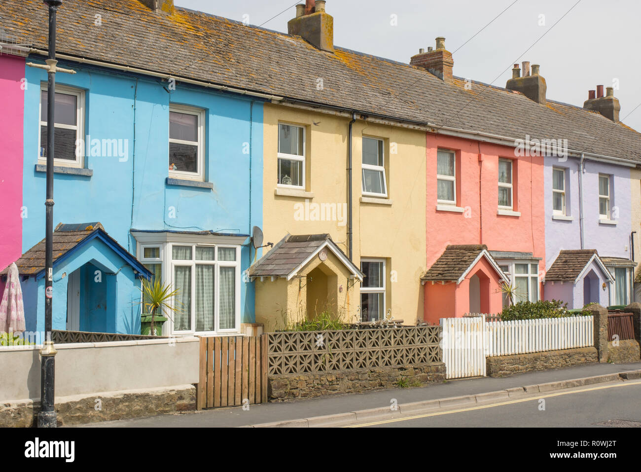 Terraced cottages painted different colours in Westward Ho!, North ...