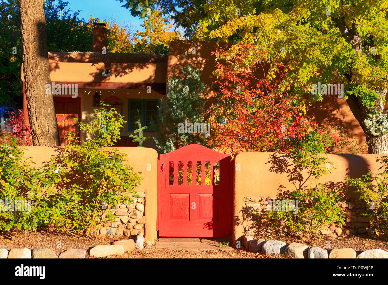 Autumn colors surround this house on Delgado Street in Santa Fe, NM USA ...