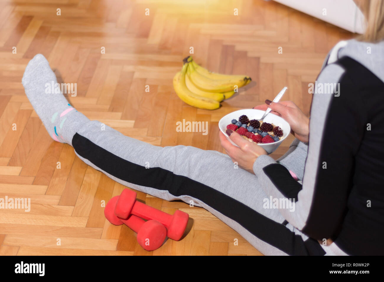 Person eating food after gym hi-res stock photography and images - Alamy