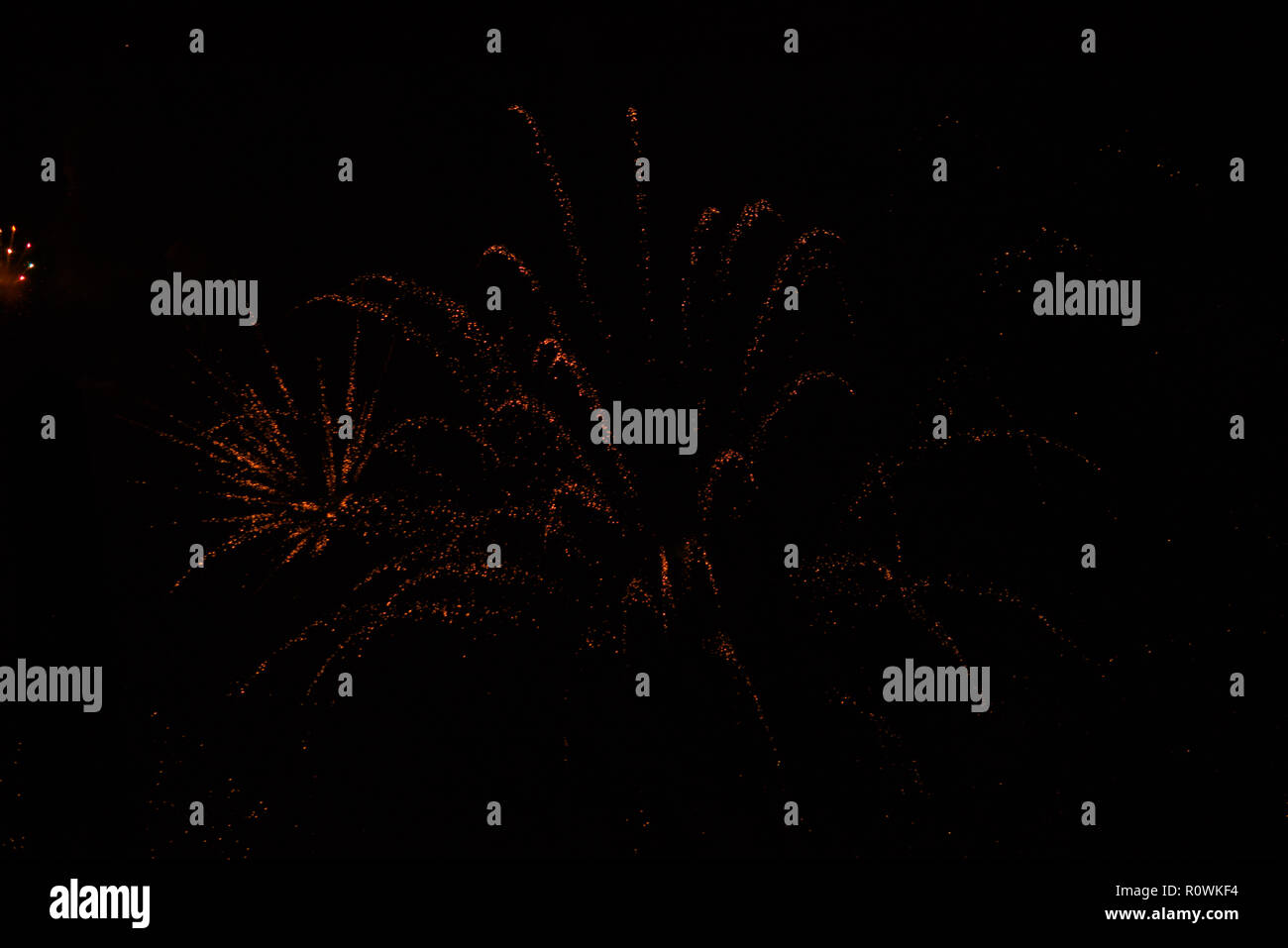 Bright, colorful fireworks in a dark night sky Stock Photo - Alamy