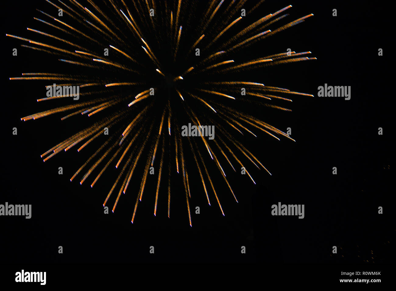 Bright, colorful fireworks in a dark night sky Stock Photo - Alamy