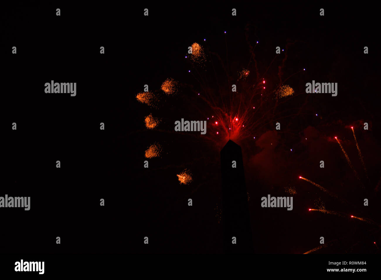 Bright, colorful fireworks in a dark night sky Stock Photo - Alamy