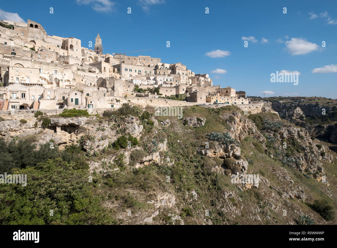 Panoramic photograph of houses built into rock in the ravine in the ...