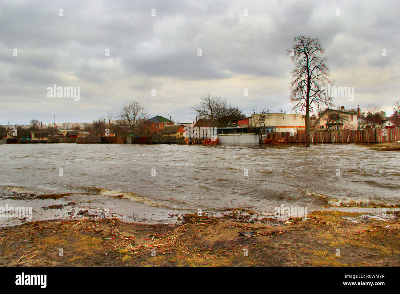 Flooding of river in spring in town during melting of snow. Flooding ...