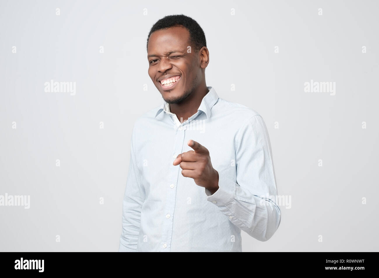 Portrait young african man saying hi-res stock photography and images ...