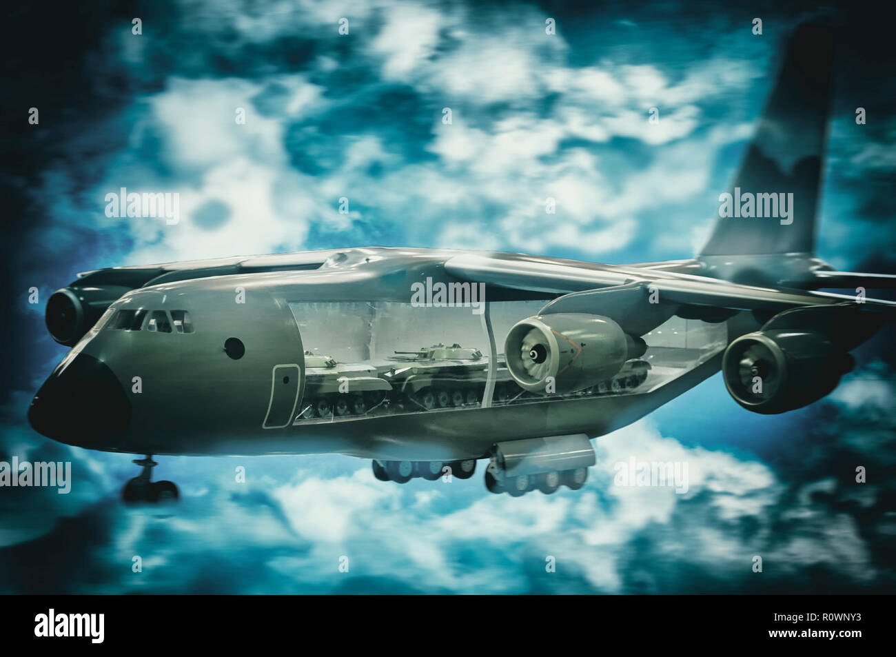 militaty heavy aircraft (plane)) deliver tanks to war Stock Photo - Alamy