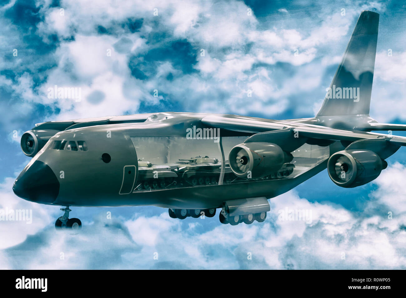 militaty heavy aircraft (plane)) deliver tanks to war Stock Photo - Alamy