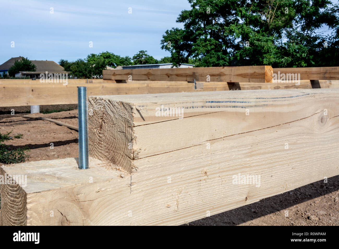 Anchor bolt for connecting pine planks of the frame house. Construction ...