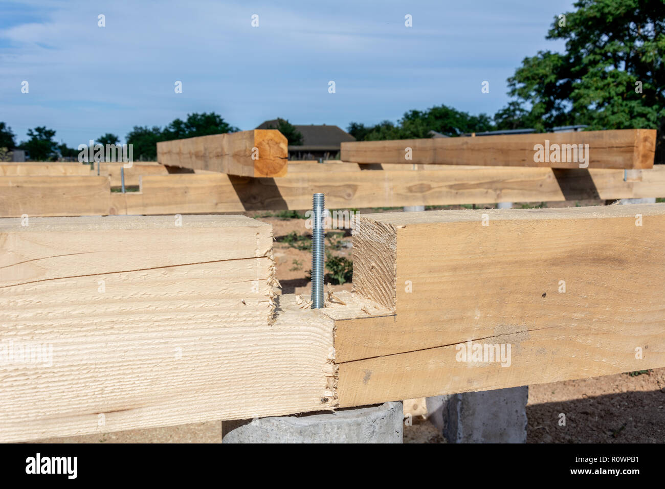 Anchor bolt for connecting pine planks of the frame house. Construction ...