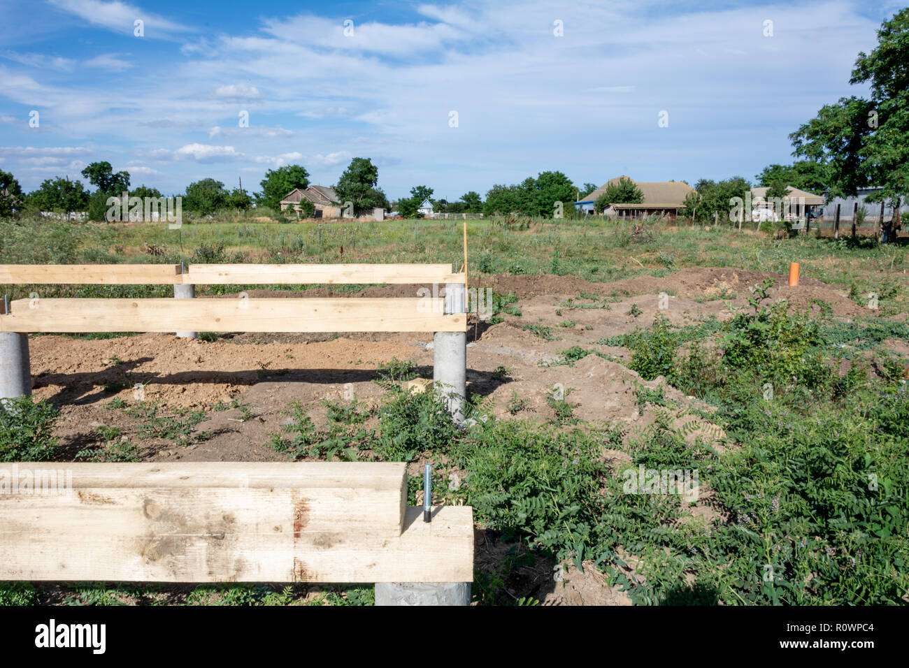 Foundation construction. Unfinished frame house. Building process of ...