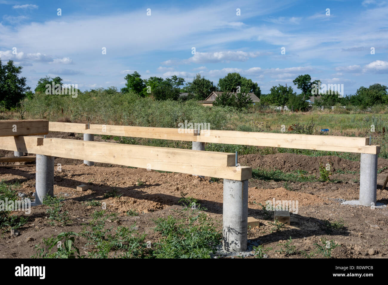 Foundation construction. Unfinished frame house. Building process of ...