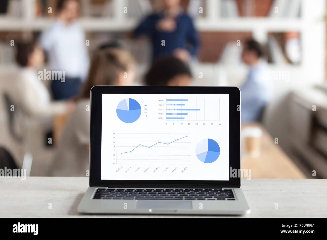Laptop with financial charts and graph on screen Stock Photo - Alamy