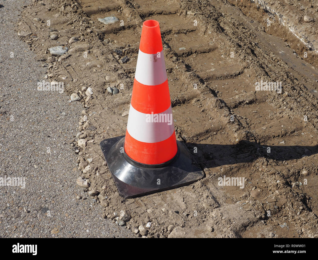 traffic cone to mark road works or temporary obstruction traffic sign ...