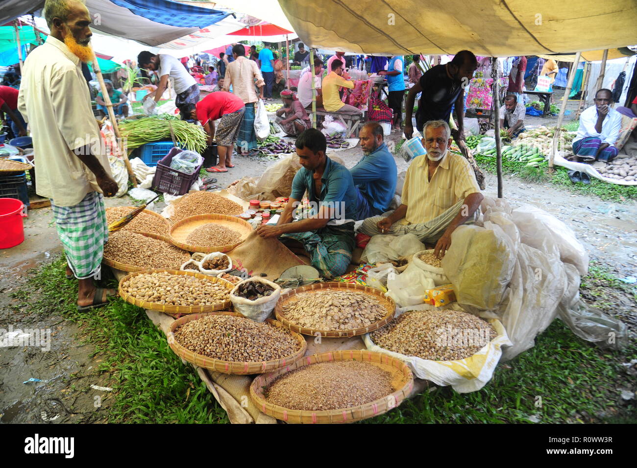A shopkeeper waiting for customers to sale betel nut at Kaikkarateke ...