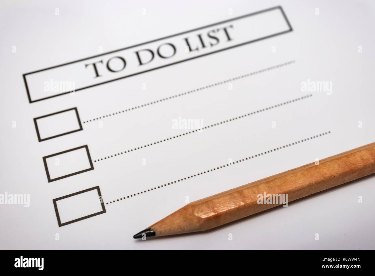 close up reminder note paper and to do list with pencil Stock Photo - Alamy