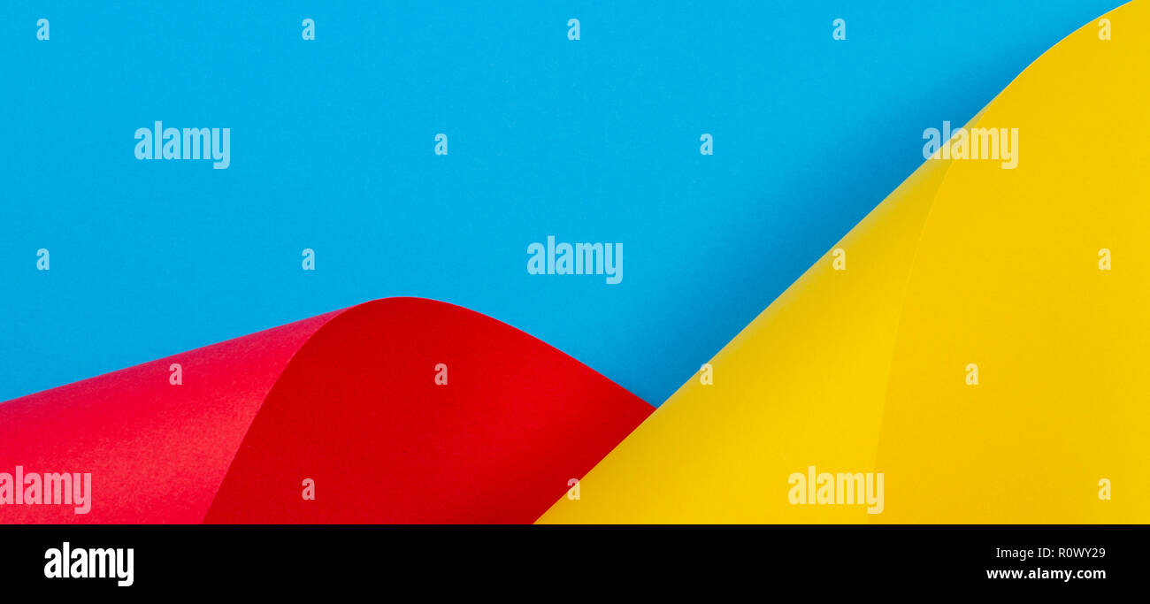 Abstract colorful background. Yellow red blue color paper in geometric ...