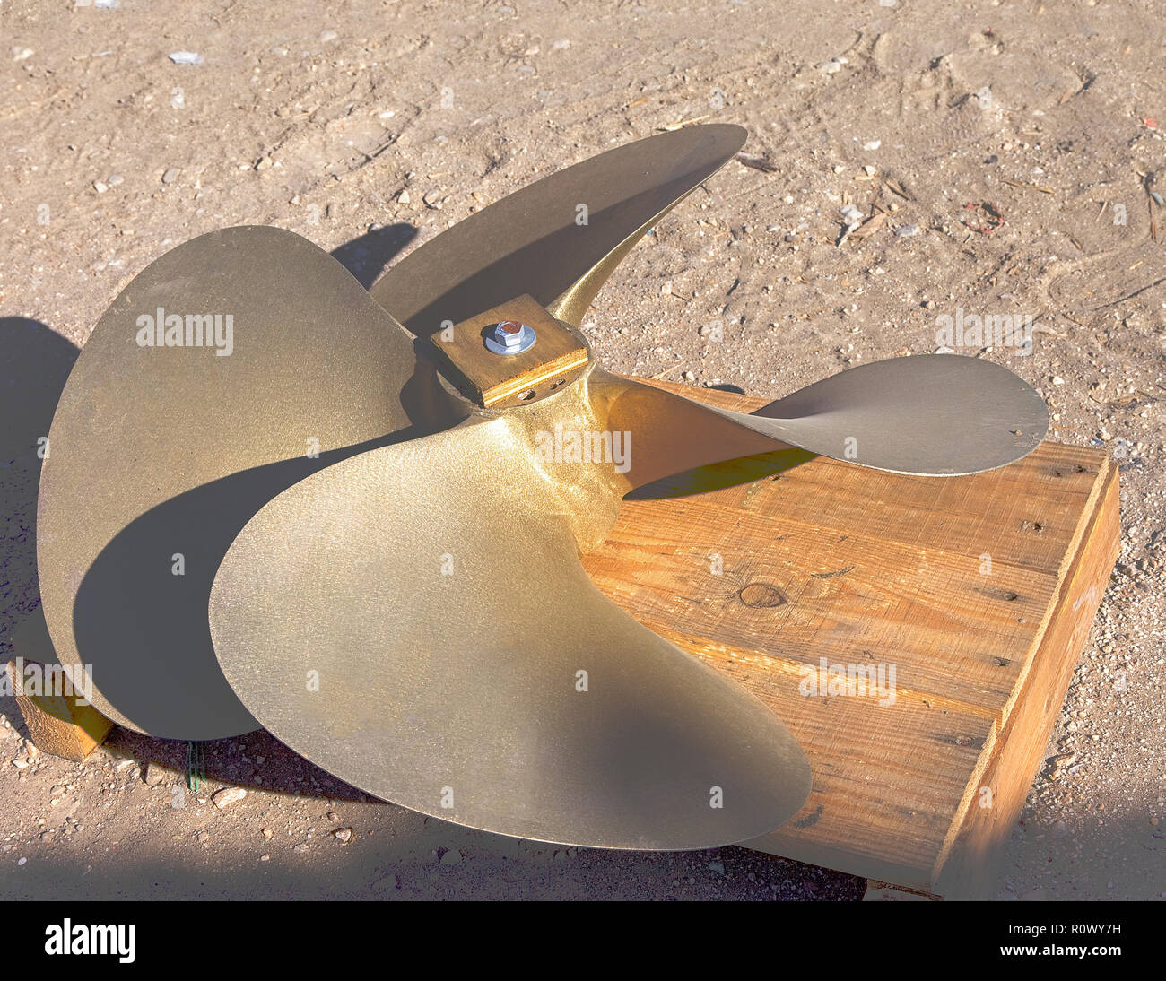 Bronze Propeller. New Propeller on ground in shipyard . Stock image ...