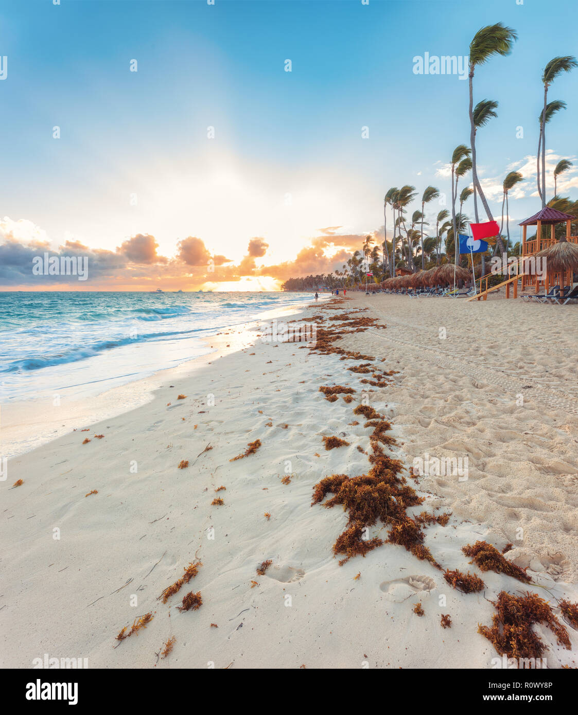 Vacation in Dominican Republic. Sunset sandy beach Stock Photo - Alamy