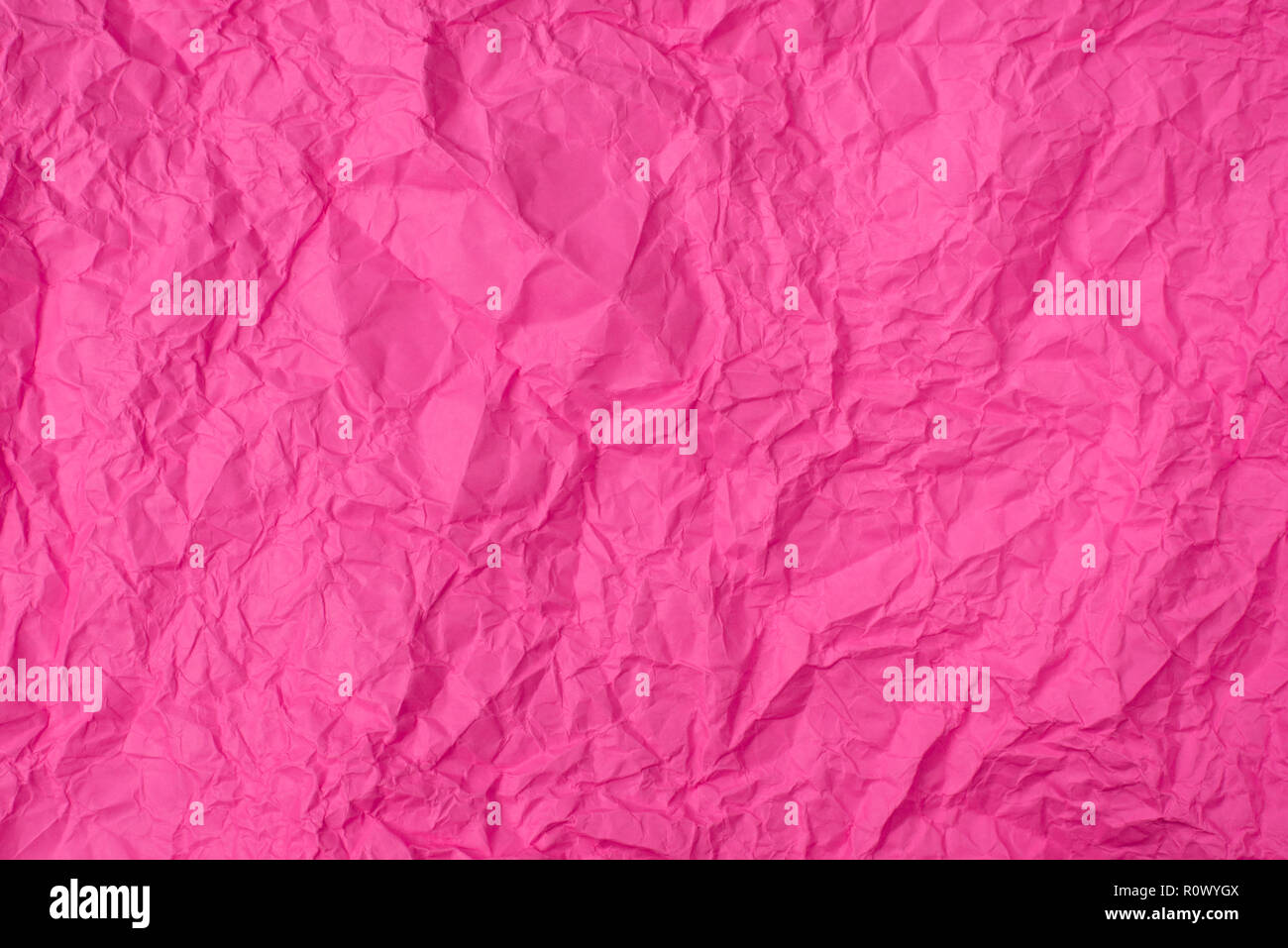 pink crumpled paper texture as background. concept of school, abstract ...