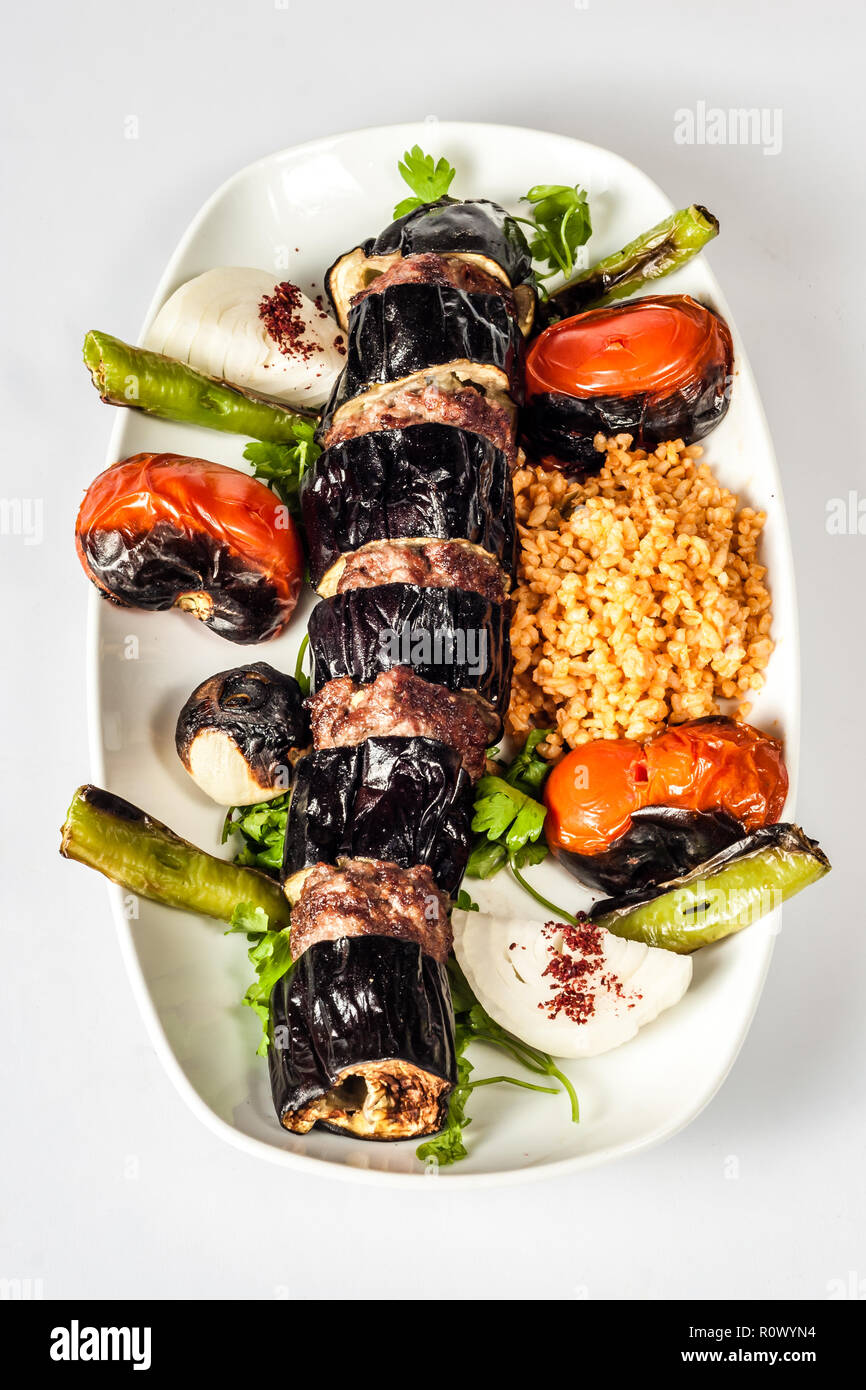 Turkish Urfa Kebab with eggplant and meatballs Stock Photo - Alamy