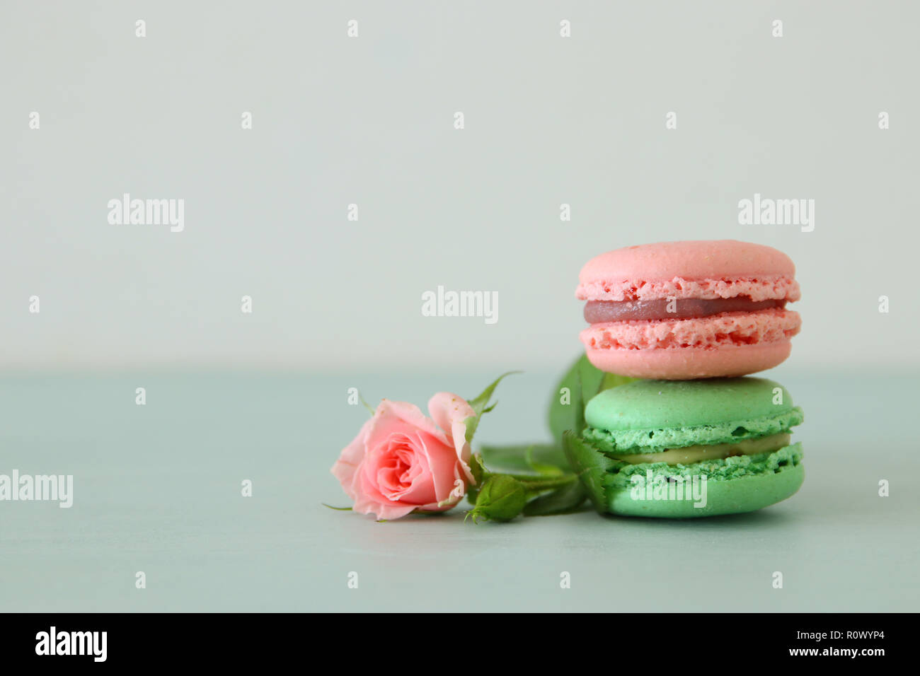 Image of romantic colorful macaron or macaroon over pastel background ...