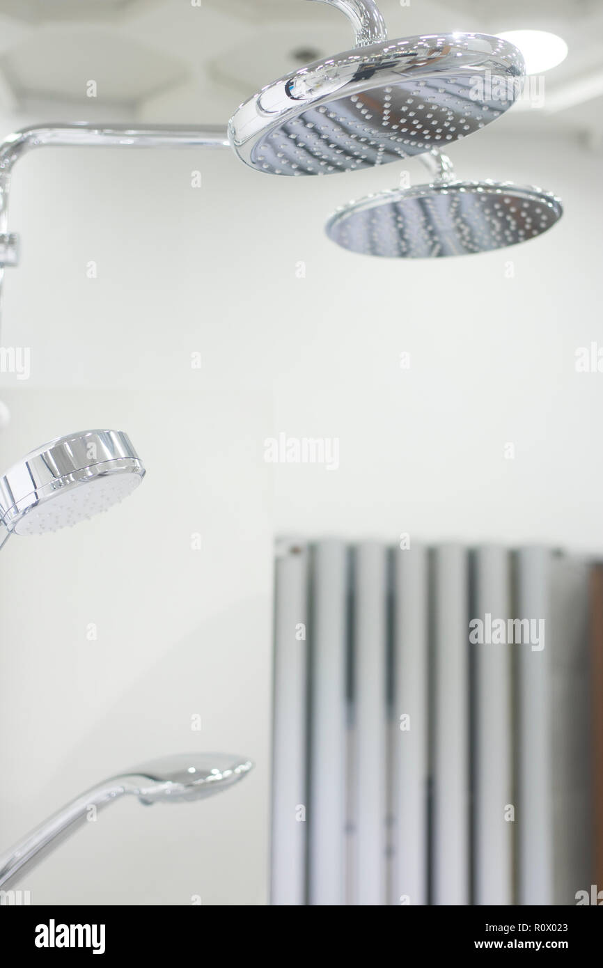 Bathroom chrome shower head showroom display of new design option for ...