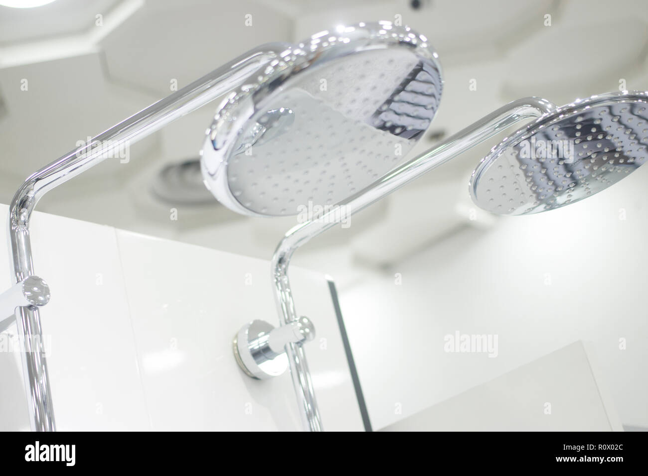 Bathroom chrome shower head showroom display of new design option for ...