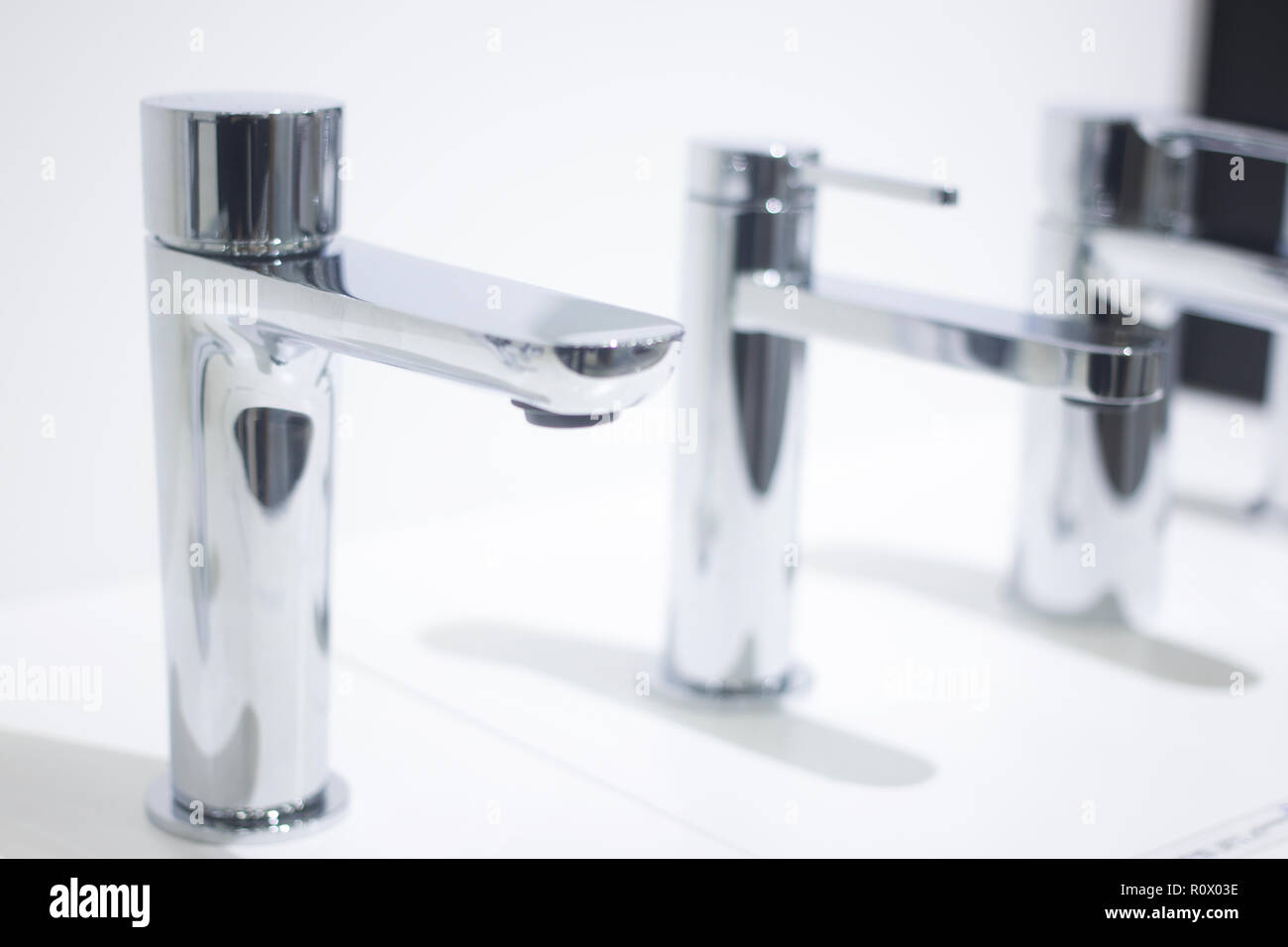Bathroom showroom display of new sink chrome tap design option for home ...
