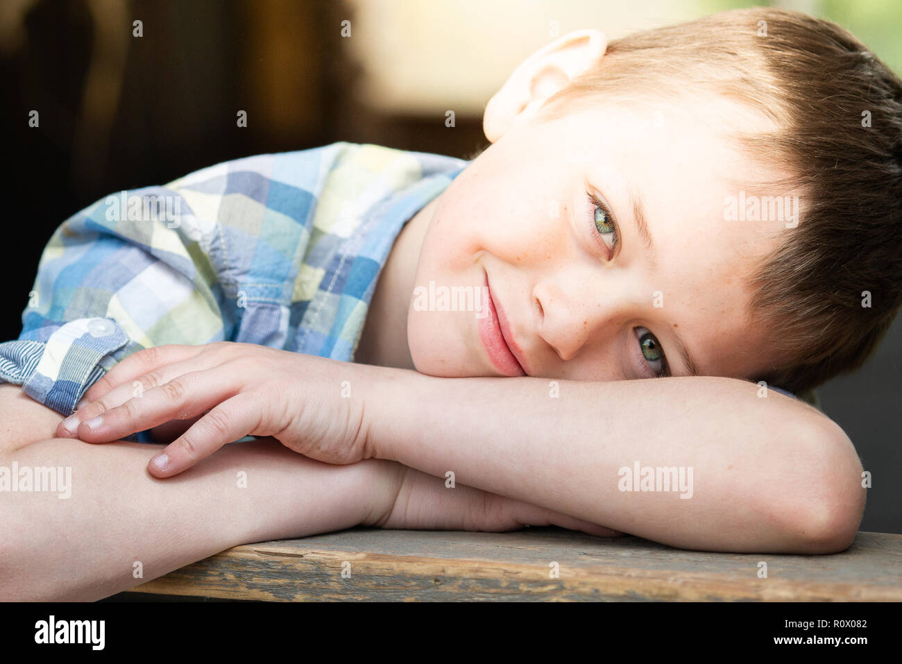 A handsome little boy with ADHD, Autism, Aspergers syndrome enjoys ...