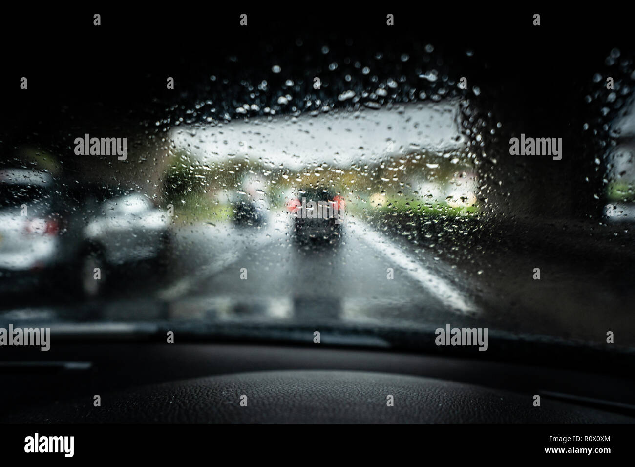Rain on the motorway, heavy rain on the windshield, windscreen whilst ...