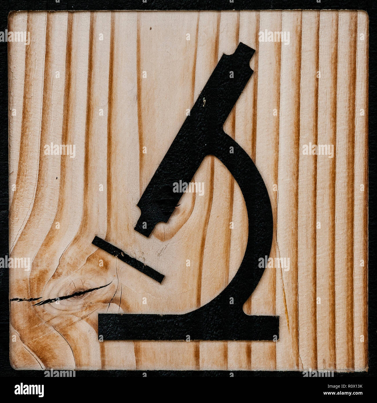 icon of microscope made in wood, people can find the labo room Stock ...