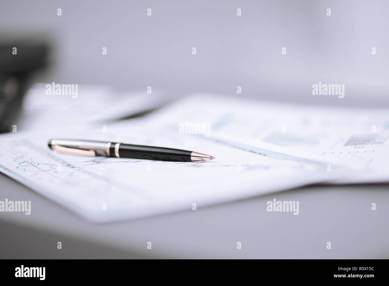 close up.pen and financial chart on the businessman's Desk Stock Photo ...