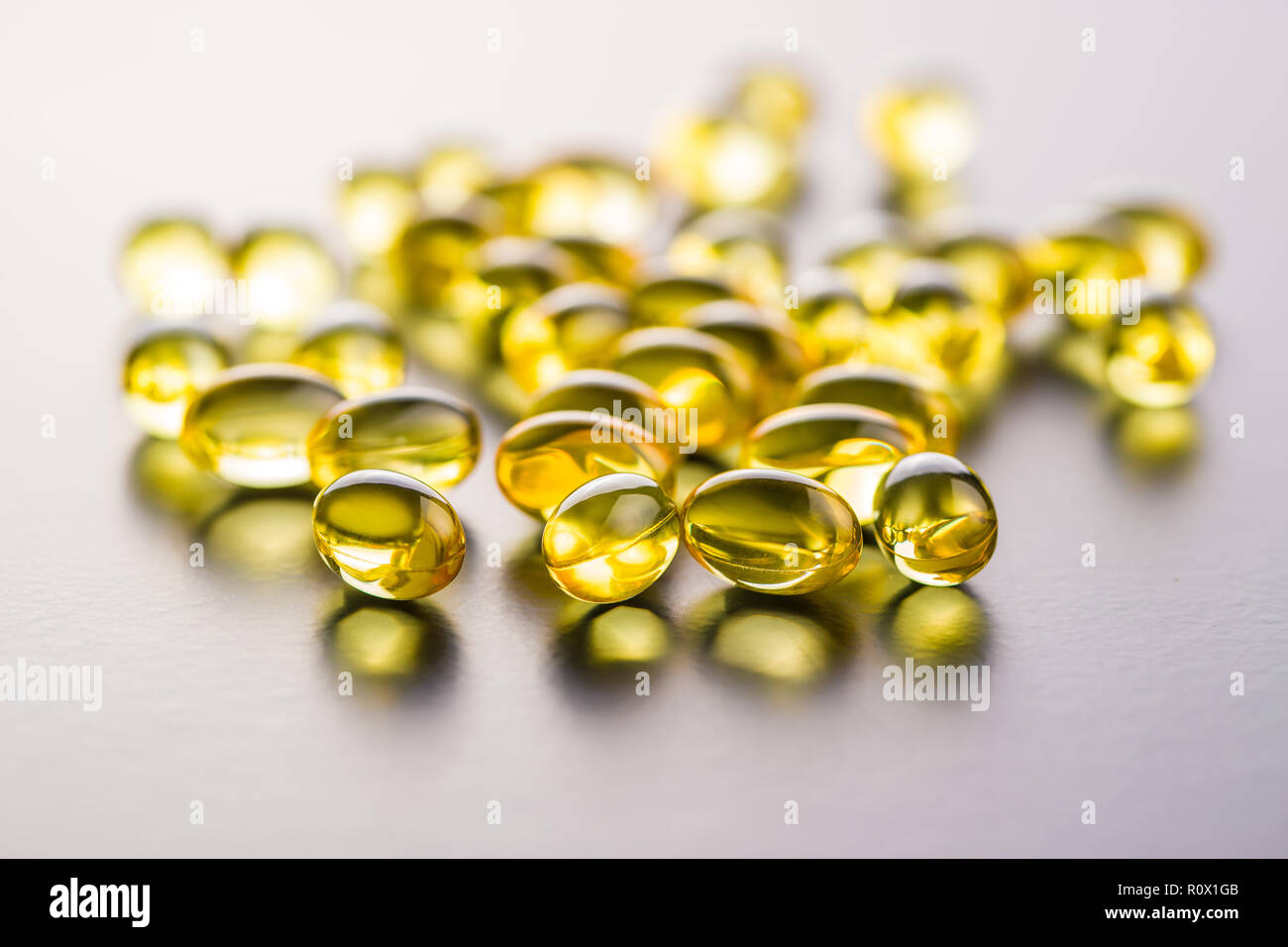 Dark capsules omega supplement hi-res stock photography and images - Alamy