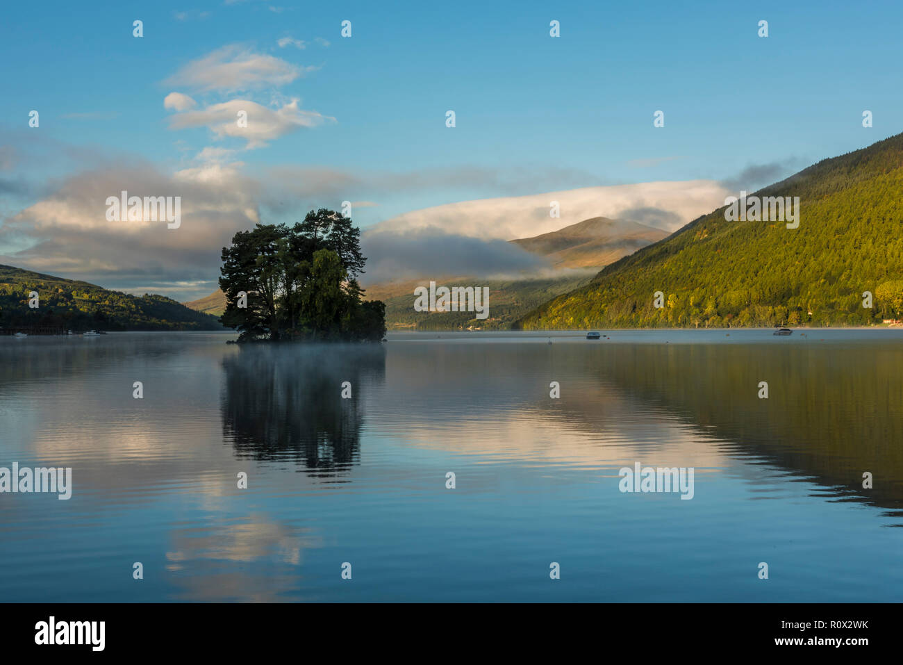 An island in Loch Tay, Perthshire, Scotland, looking towards Ben Lawers ...