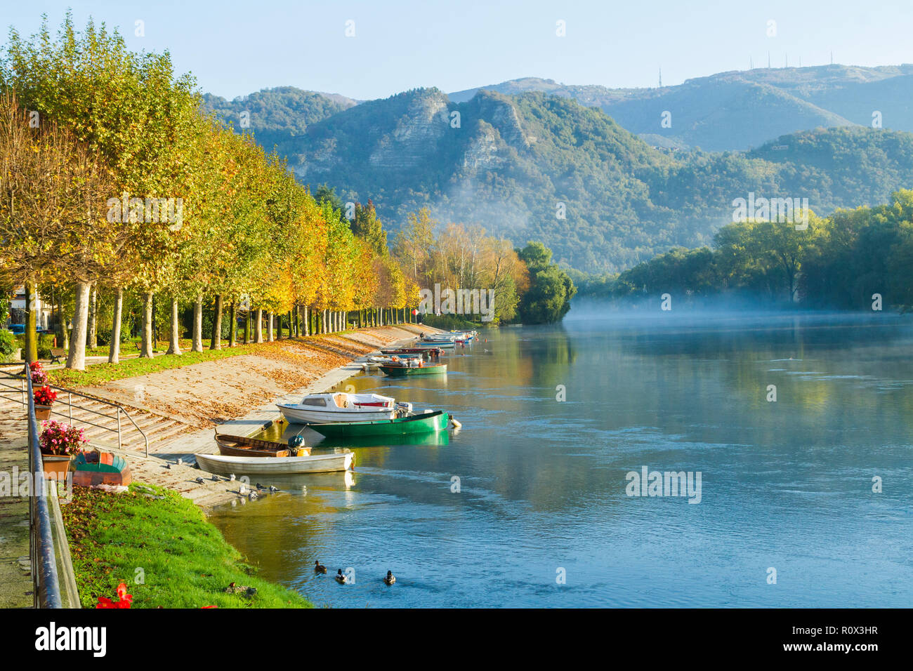 Autumnal landscape along a river, italian countryside Stock Photo - Alamy