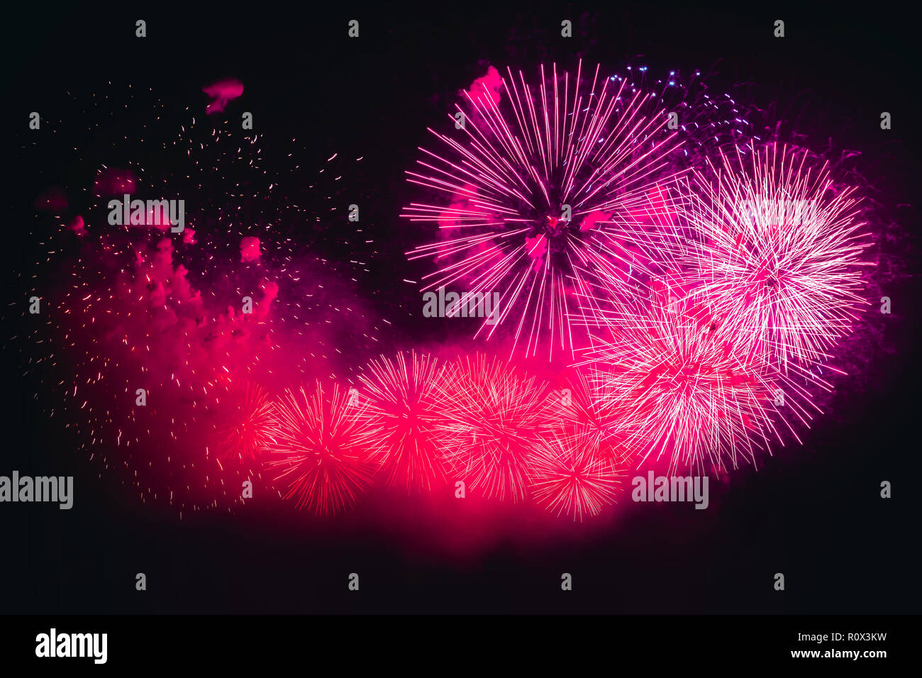 Colorful fireworks explosion on the black background Stock Photo - Alamy